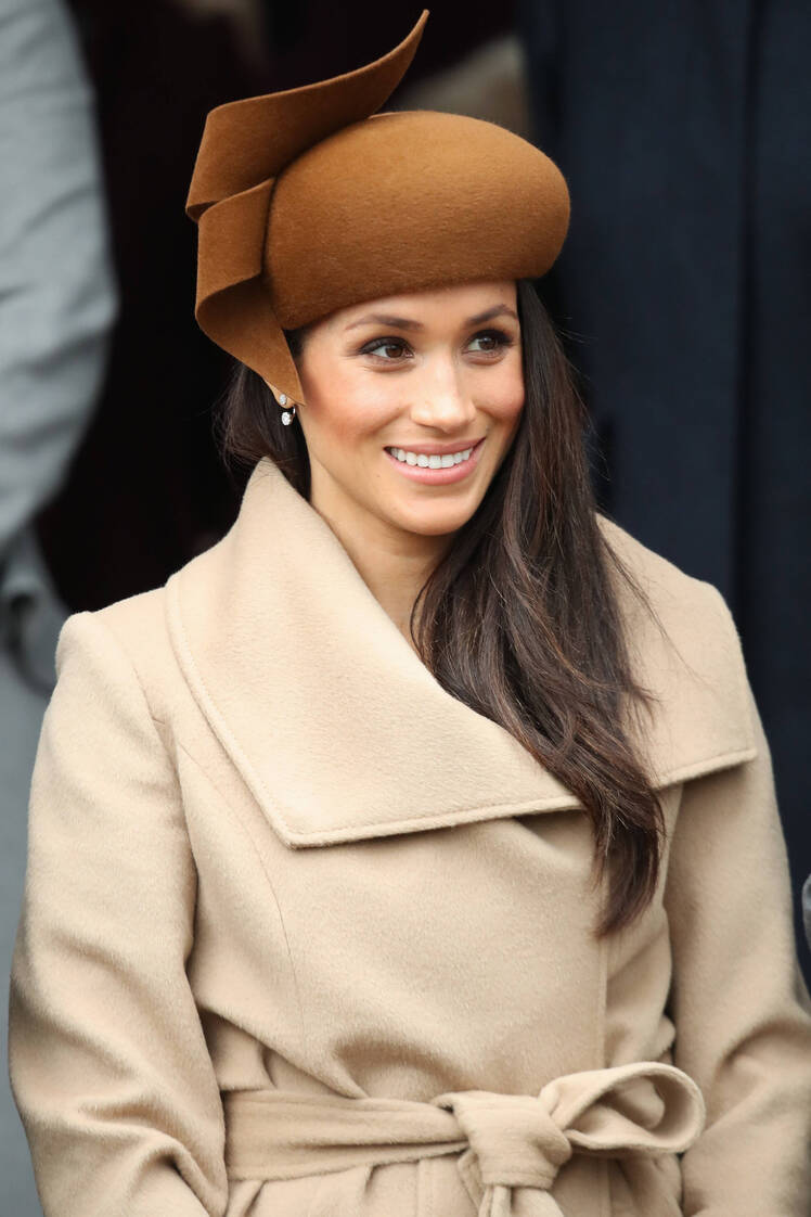 Meghan Markle Does a Christmas Curtsey for Queen Elizabeth | Closer Weekly